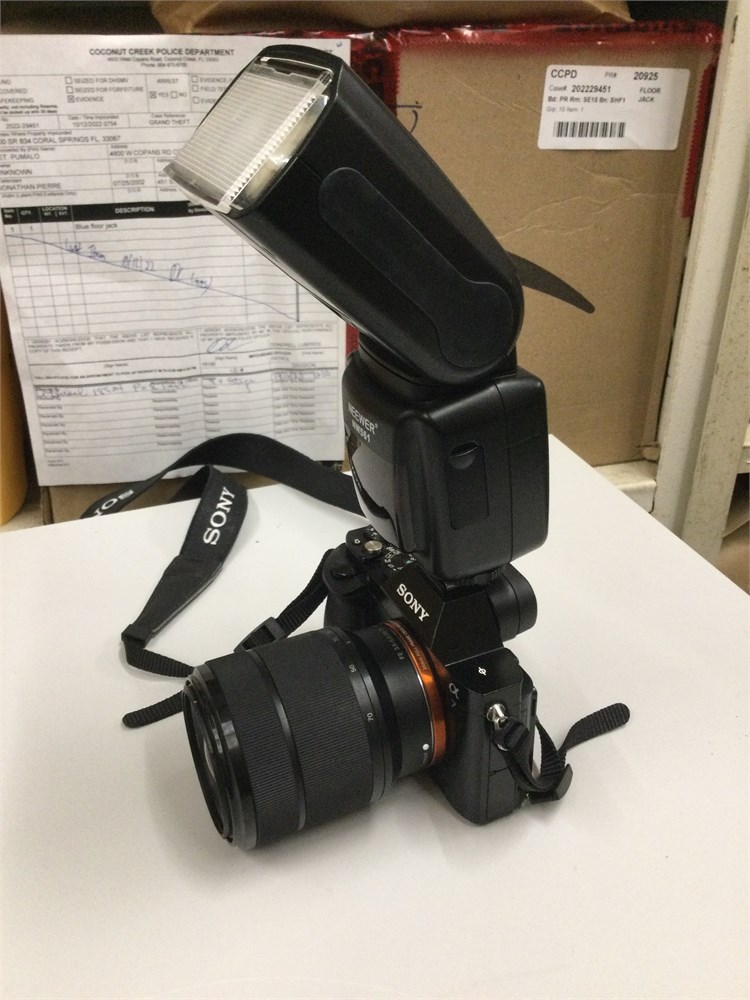 BIDERA Government Auctions - Sony AX7 Digital Camera with a Flash